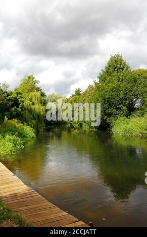 A view of the upper reaches of the River Bure with staging for the ...