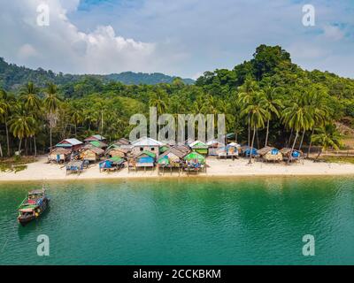 Moken, sea gypsy village on a white sand beach on Dome Island, Mergui ...