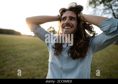 Happy young man Stock Photo - Alamy