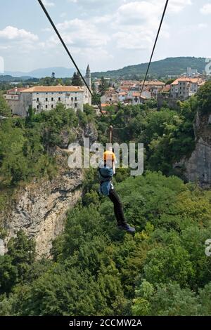 Riding the zip line Stock Photo - Alamy