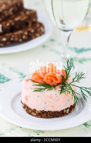 rye bread canapes with salmon and ricotta Stock Photo - Alamy