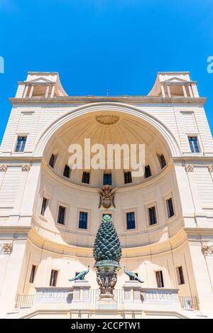 Ancient bronze Pigna, or pine cone, statue in the Vatican courtyard in ...