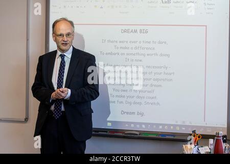 Education Minister Peter Weir talking with pupils at St Joesph's ...