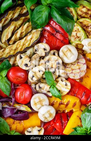 Vegetarian meal, grilling paprika, eggplants and zucchini on white ...