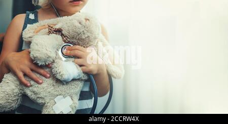 Doctor with banner Stock Photo - Alamy