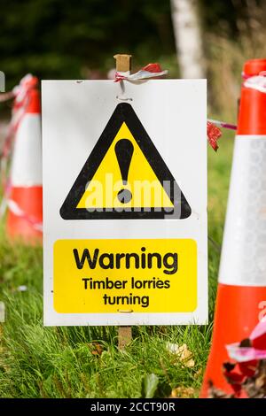 Timber lorries turning warning / health and safety sign Stock Photo - Alamy