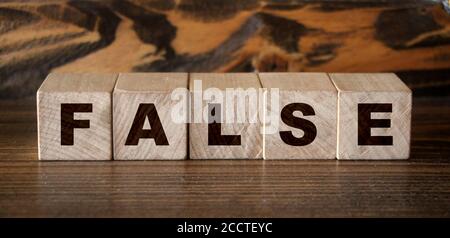 Letter tiles on black slate background spelling Social Studies Stock ...