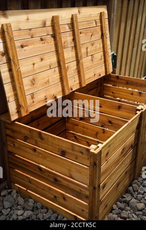 Two bin composter made of cedar wood with open lid for grass clippings ...