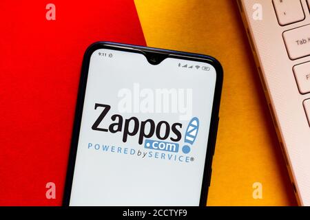 In this photo illustration a Zappos logo seen displayed on a smartphone ...