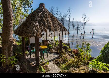 A thatched-roofed open classroom of a Spanish language school on the ...