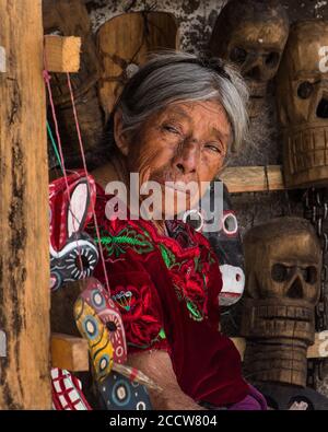 Cakchiquel people Kaqchikel Maya woman girl weaving manual labor ...