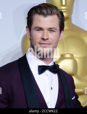 Chris Hemsworth poses in the press room at the Oscars on Sunday, March ...