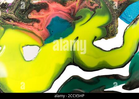 Bright mix paint spilled on white background with golden glitter Stock ...