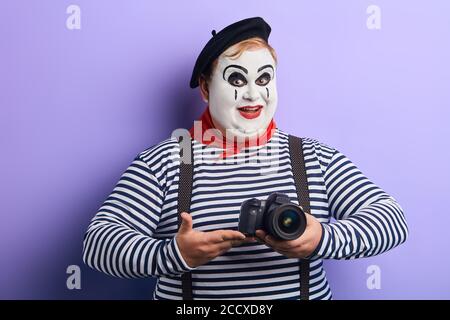 scared mime taking photo with film camera isolated on white Stock Photo ...