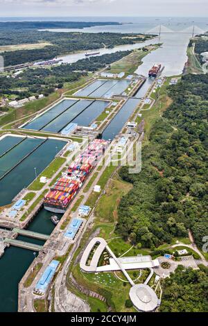 Aerial view of two Neo-Panamax container ships crossing the third set ...