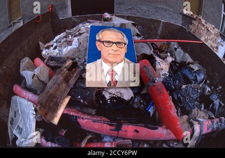 Official Honecker portrait in a waste container, shortly after the fall ...