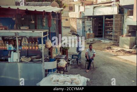 Egypt, Hurghada. egyptian everyday street life at sidewalk buildings ...