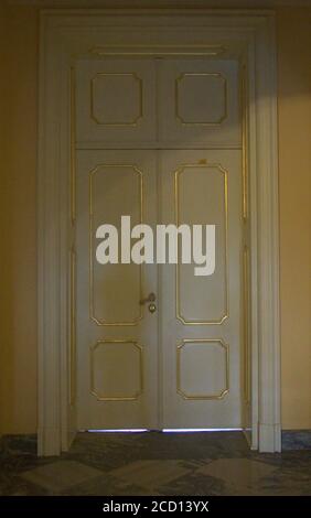 detail of a white door and checkered floor Stock Photo - Alamy
