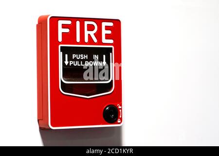 Red button handbrake fire alarm on the wall Stock Photo - Alamy