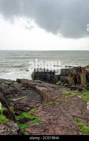 Monsoon Season view of the rough Arabian Sea and Rocky Shoreline near ...
