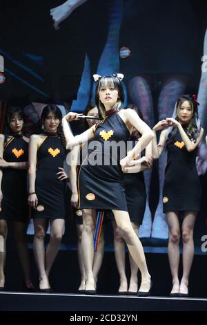 Beautiful cosplayers are seen posing and performing in clotThes shown ...