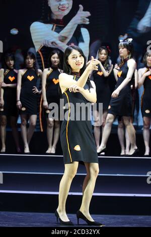 Beautiful cosplayers are seen posing and performing in clotThes shown ...