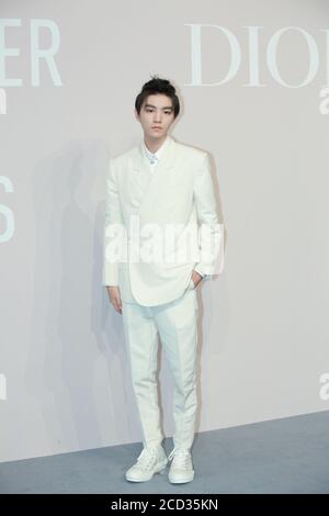 Chinese singer and actor Wang Junkai attended the Christian Louboutin ...