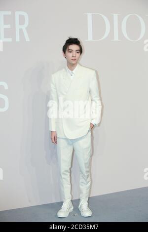 Chinese singer and actor Wang Junkai attended the Christian Louboutin ...