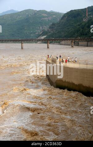 Aerial view of Sanmenxia Water Reservoir discharging water in Sanmenxia ...