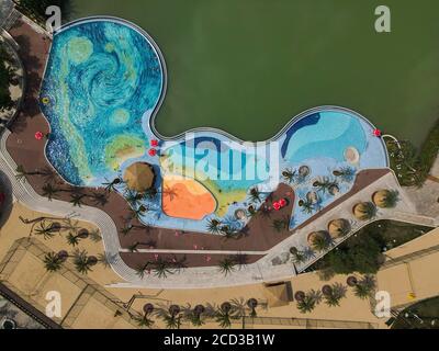 Aerial view of Sichuan's biggest outdoor swimming pool that is paved ...