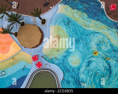 Aerial view of Sichuan's biggest outdoor swimming pool that is paved ...