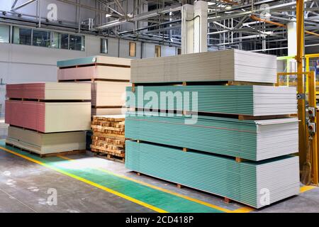 Pallet with plasterboard in the building store. Warehouse with ...