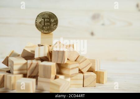 Business hierarchy. Strategy concept with bitcoin. Golden bitcoin at ...