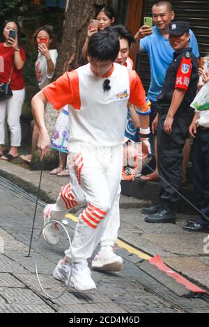 Chinese actor Yang Yang is seen playing a game during the recording of ...