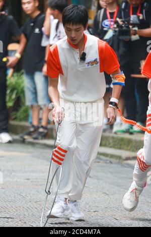 Chinese actor Yang Yang is seen playing a game during the recording of ...