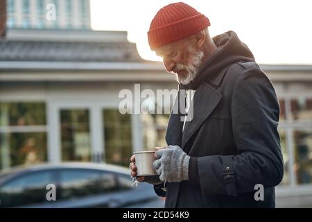 Penniless man collect money for shelter, food. Male desperately look at ...