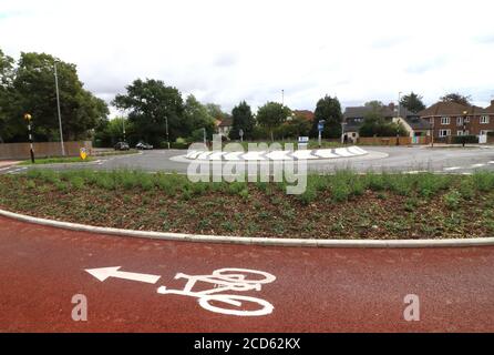 Cycle path marked on roundabout crossing.Britain's first Dutch-style ...