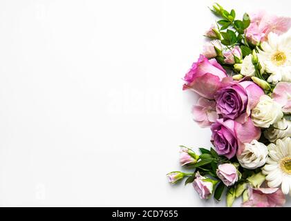 Framework from flowers on white background. Flat lay Stock Photo - Alamy