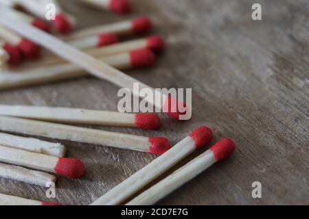 Red Matchsticks scattered on the table Stock Photo - Alamy