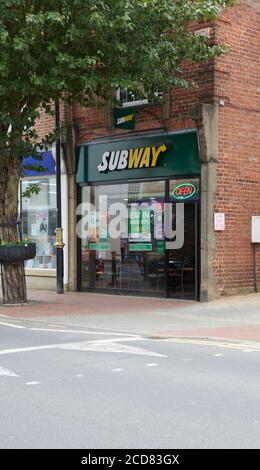 Exterior of an empty Subway fast food restaurant at night, England, UK ...