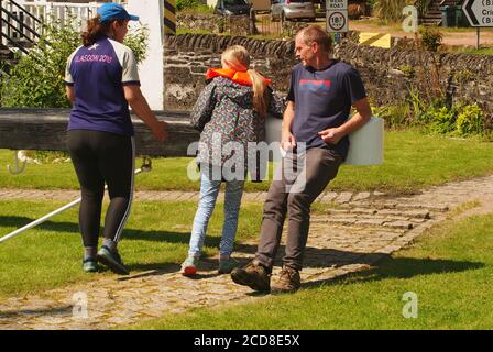 Man pushing gate open Stock Photo - Alamy