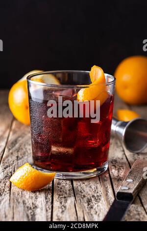 Boulevardier cocktail and orange zest on rusty background Stock Photo ...