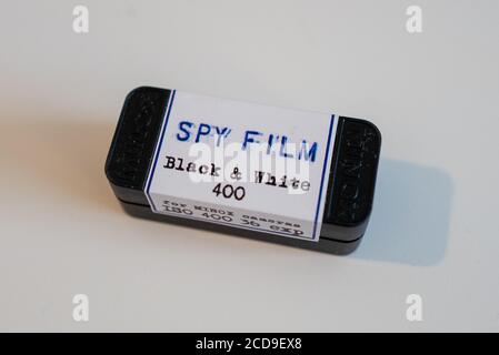 Close-up of Minox B Subminiature film camera concealed in a man's hand ...