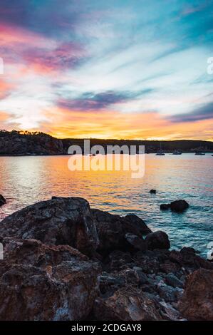 Mesmerizing view of an adorable sunset over a sea Stock Photo - Alamy