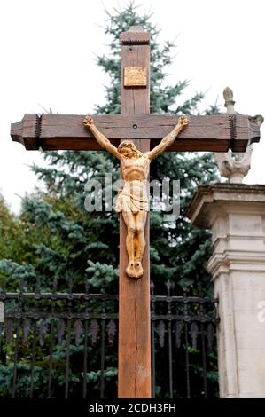 The crucifixion from a tree with Jesus's gilt figure Stock Photo - Alamy