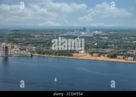 Aerial view Dutch city Almere with residential area between lake ...
