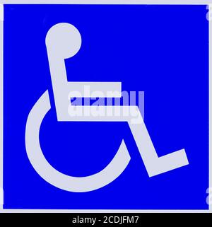 Close up image of paraplegic handicapped man in wheelchair in park. He ...