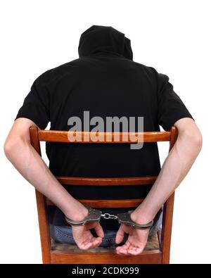 Man on the chair in Handcuffs. Men criminal in handcuffs arrested for ...