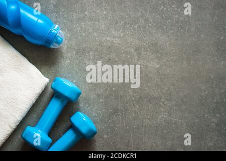 Fitness equipment at stone background top view Stock Photo - Alamy