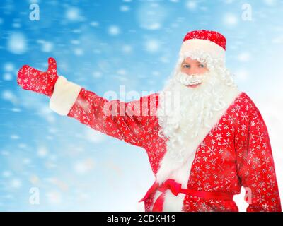 santa claus stretch the hand Stock Photo - Alamy